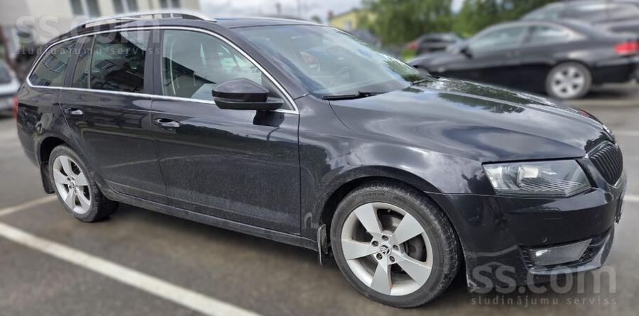 Black Skoda Octavia 2014 in Riga, with an engine capacity of 2.00 L and mileage of 312 thousand km for 6700 €, photo 4 on AUTOMOTO.COM.LV
