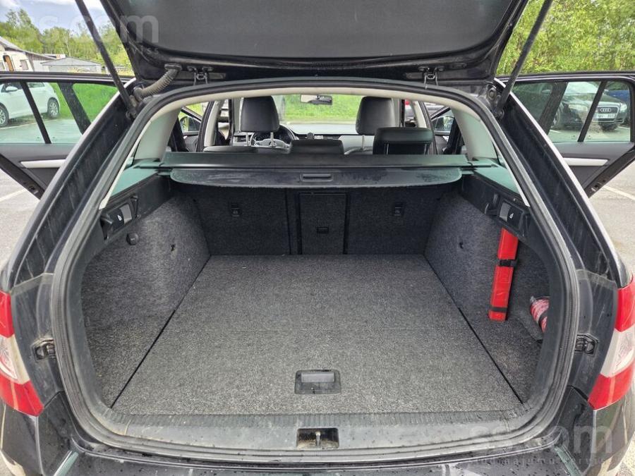 Black Skoda Octavia 2014 in Riga, with an engine capacity of 2.00 L and mileage of 312 thousand km for 6700 €, photo 6 on AUTOMOTO.COM.LV