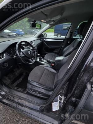 Black Skoda Octavia 2014 in Riga, with an engine capacity of 2.00 L and mileage of 312 thousand km for 6700 €, photo 8 on AUTOMOTO.COM.LV
