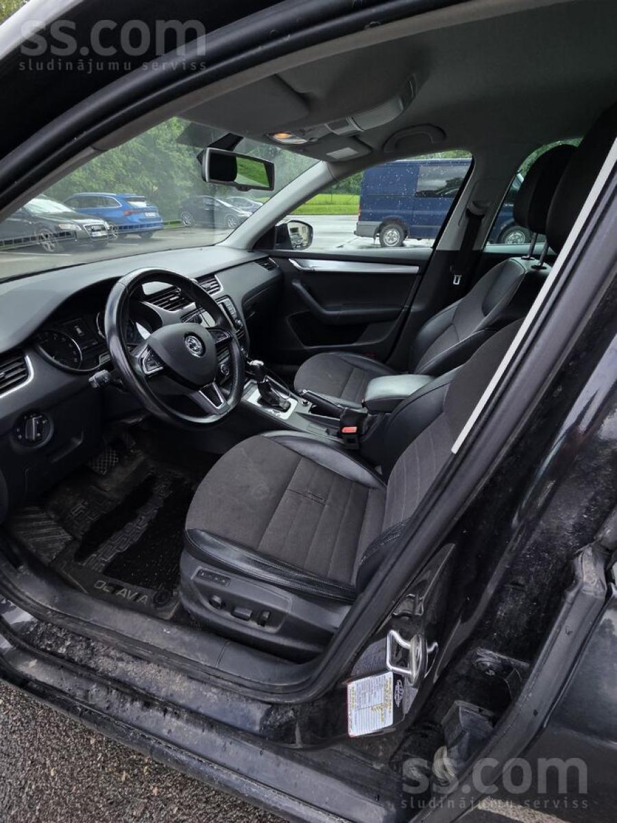Black Skoda Octavia 2014 in Riga, with an engine capacity of 2.00 L and mileage of 312 thousand km for 6700 €, photo 8 on AUTOMOTO.COM.LV