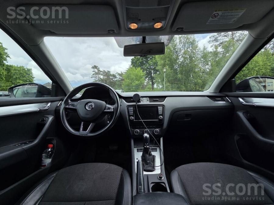 Black Skoda Octavia 2014 in Riga, with an engine capacity of 2.00 L and mileage of 312 thousand km for 6700 €, photo 9 on AUTOMOTO.COM.LV