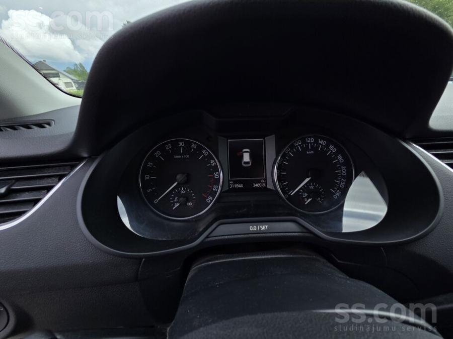 Black Skoda Octavia 2014 in Riga, with an engine capacity of 2.00 L and mileage of 312 thousand km for 6700 €, photo 10 on AUTOMOTO.COM.LV