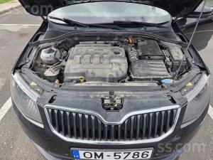 Black Skoda Octavia 2014 in Riga, with an engine capacity of 2.00 L and mileage of 312 thousand km for 6700 €, photo 11 on AUTOMOTO.COM.LV