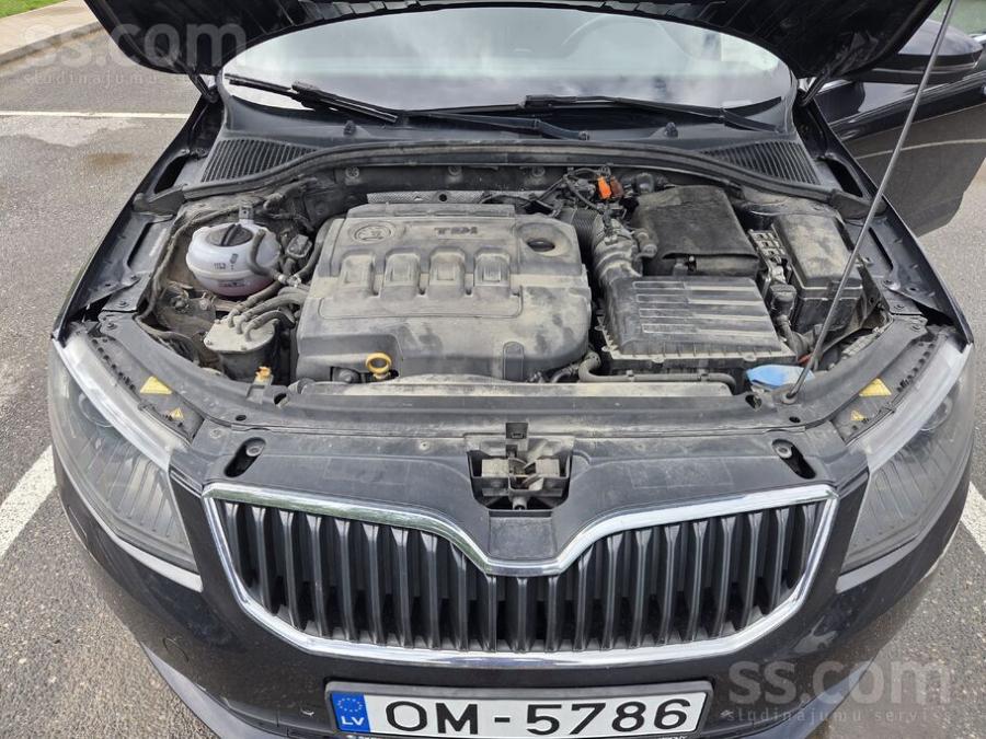 Black Skoda Octavia 2014 in Riga, with an engine capacity of 2.00 L and mileage of 312 thousand km for 6700 €, photo 11 on AUTOMOTO.COM.LV