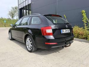 Black Skoda Octavia 2014 in Vilnius, with an engine capacity of 1.97 L and mileage of 301 thousand km for 6900 €, photo 4 on AUTOMOTO.COM.LV