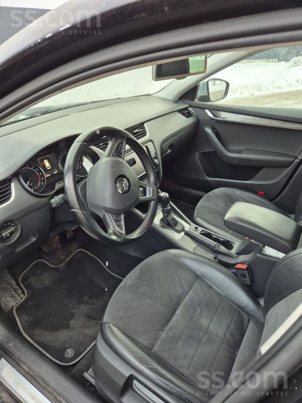 Black Skoda Octavia 2015 in Riga, with an engine capacity of 2.00 L and mileage of 265 thousand km for 9400 €, photo 7 on AUTOMOTO.COM.LV