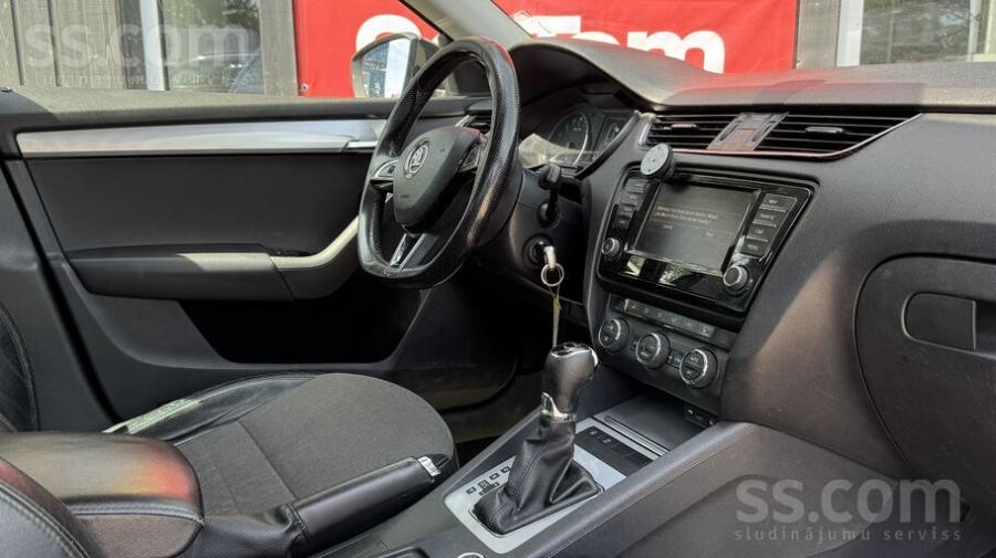 Black Skoda Octavia 2015 in Riga, with an engine capacity of 2.00 L and mileage of 0 thousand km for 4900 €, photo 11 on AUTOMOTO.COM.LV