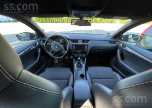 Black Skoda Octavia 2015 in Riga, with an engine capacity of 2.00 L and mileage of 149 thousand km for 10900 €, photo 9 on AUTOMOTO.COM.LV