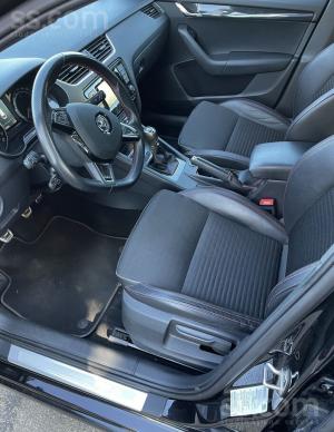 Black Skoda Octavia 2015 in Riga, with an engine capacity of 2.00 L and mileage of 149 thousand km for 10900 €, photo 11 on AUTOMOTO.COM.LV