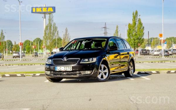 Black Skoda Octavia 2015 in Riga, with an engine capacity of 2.00 L and mileage of 220 thousand km for 6990 €, photo 1 on AUTOMOTO.COM.LV