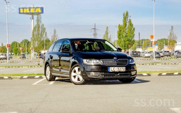 Black Skoda Octavia 2015 in Riga, with an engine capacity of 2.00 L and mileage of 220 thousand km for 6990 €, photo 3 on AUTOMOTO.COM.LV