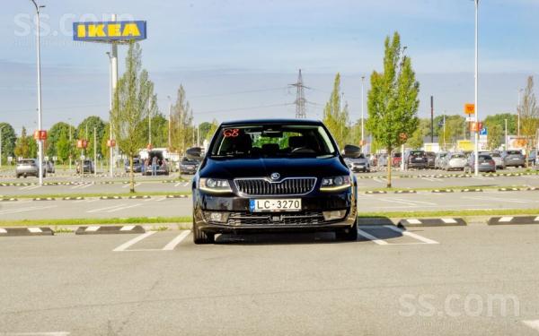 Black Skoda Octavia 2015 in Riga, with an engine capacity of 2.00 L and mileage of 220 thousand km for 6990 €, photo 4 on AUTOMOTO.COM.LV