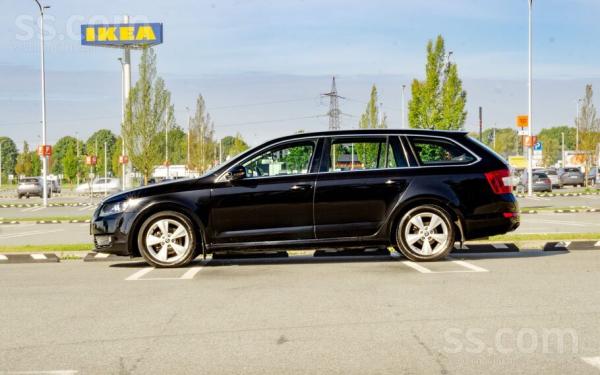 Black Skoda Octavia 2015 in Riga, with an engine capacity of 2.00 L and mileage of 220 thousand km for 6990 €, photo 6 on AUTOMOTO.COM.LV