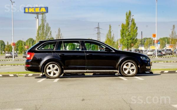 Black Skoda Octavia 2015 in Riga, with an engine capacity of 2.00 L and mileage of 220 thousand km for 6990 €, photo 10 on AUTOMOTO.COM.LV