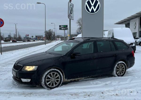 Black Skoda Octavia 2016 in Riga, with an engine capacity of 2.00 L and mileage of 223 thousand km for 9750 €, photo 1 on AUTOMOTO.COM.LV