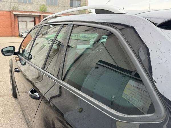 Black Skoda Octavia 2016 in Riga, with an engine capacity of 2.00 L and mileage of 241 thousand km for 7990 €, photo 6 on AUTOMOTO.COM.LV