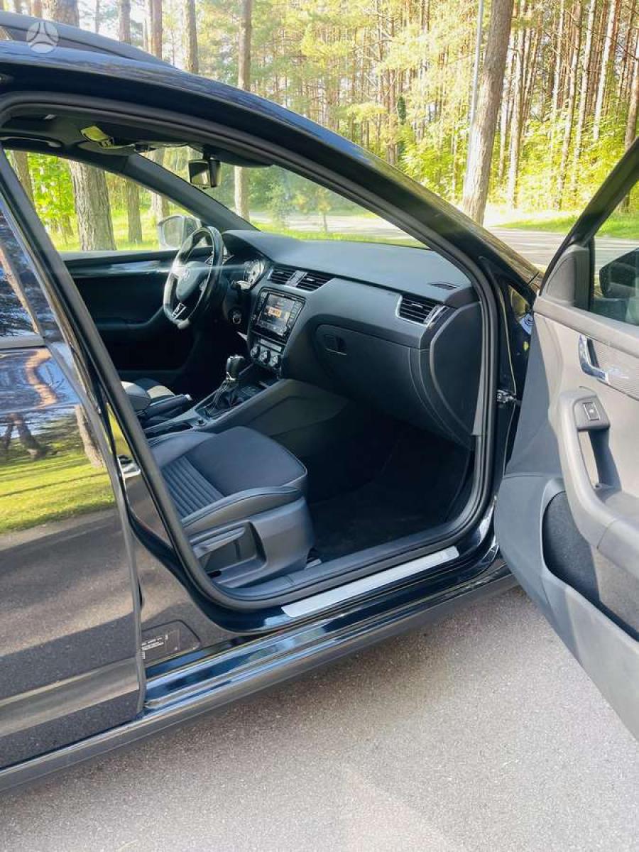 Black Skoda Octavia 2016 in Vilnius, with an engine capacity of 1.97 L and mileage of 291 thousand km for 8900 €, photo 31 on AUTOMOTO.COM.LV
