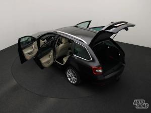 Black Skoda Octavia 2017 in Vilnius, with an engine capacity of 2.00 L and mileage of 236 thousand km for 10699 €, photo 14 on AUTOMOTO.COM.LV