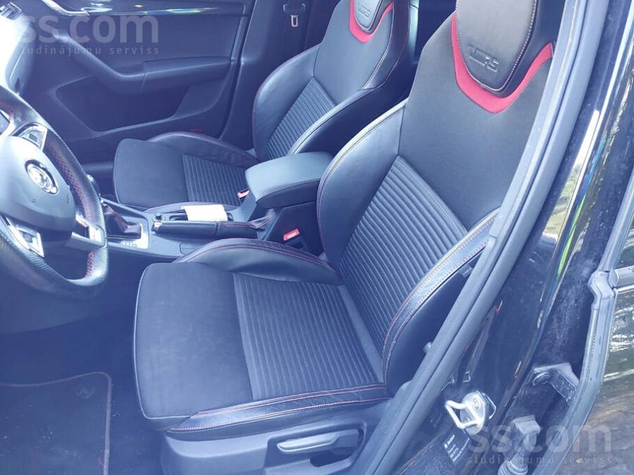 Black Skoda Octavia 2017 in Riga, with an engine capacity of 2.00 L and mileage of 220 thousand km for 11490 €, photo 9 on AUTOMOTO.COM.LV