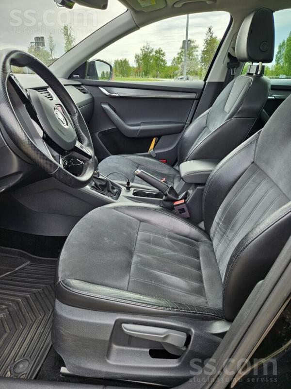 Black Skoda Octavia 2018 in Riga, with an engine capacity of 1.60 L and mileage of 258 thousand km for 10790 €, photo 9 on AUTOMOTO.COM.LV