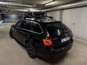 Black Skoda Octavia 2019 in Riga, with an engine capacity of 1.50 L and mileage of 193 thousand km for 12850 €, photo 4 on AUTOMOTO.COM.LV