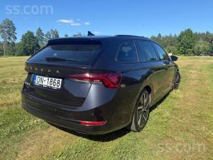 Black Skoda Octavia 2020 in Riga, with an engine capacity of 2.00 L and mileage of 266 thousand km for 16500 €, photo 4 on AUTOMOTO.COM.LV