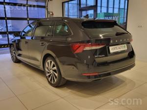 Black Skoda Octavia 2021 in Riga, with an engine capacity of 2.00 L and mileage of 132 thousand km for 21990 €, photo 4 on AUTOMOTO.COM.LV