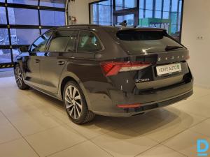 Black Skoda Octavia 2021 in Riga, with an engine capacity of 2.00 L and mileage of 132 thousand km for 21690 €, photo 3 on AUTOMOTO.COM.LV