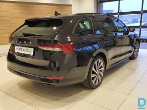 Black Skoda Octavia 2021 in Riga, with an engine capacity of 2.00 L and mileage of 132 thousand km for 21690 €, photo 4 on AUTOMOTO.COM.LV