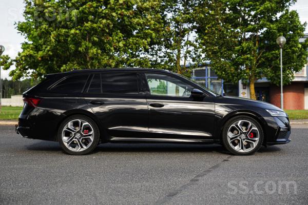 Black Skoda Octavia 2021 in Jelgava, with an engine capacity of 2.00 L and mileage of 265 thousand km for 23500 €, photo 8 on AUTOMOTO.COM.LV