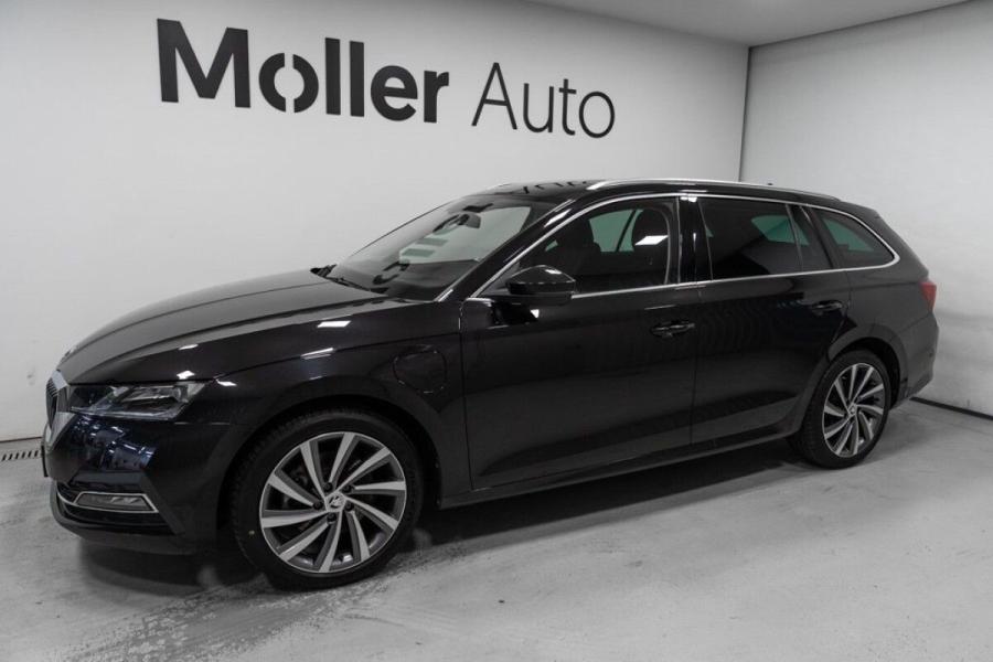 Black Skoda Octavia 2021 in Vilnius, with an engine capacity of 1.40 L and mileage of 76 thousand km for 20900 €, photo 6 on AUTOMOTO.COM.LV