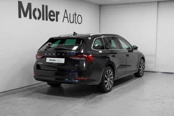 Black Skoda Octavia 2021 in Vilnius, with an engine capacity of 1.40 L and mileage of 76 thousand km for 20900 €, photo 6 on AUTOMOTO.COM.LV