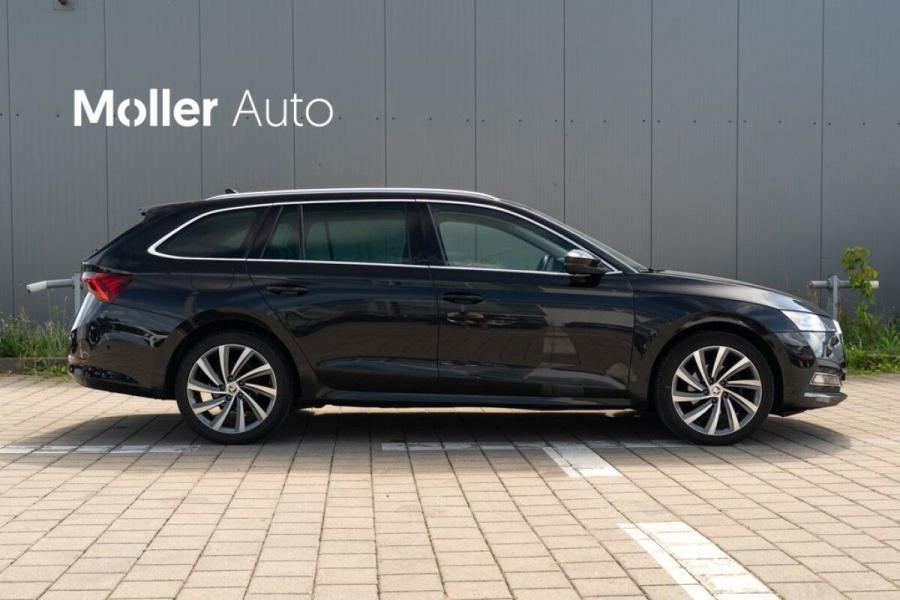 Black Skoda Octavia 2021 in Vilnius, with an engine capacity of 2.00 L and mileage of 166 thousand km for 17950 €, photo 6 on AUTOMOTO.COM.LV