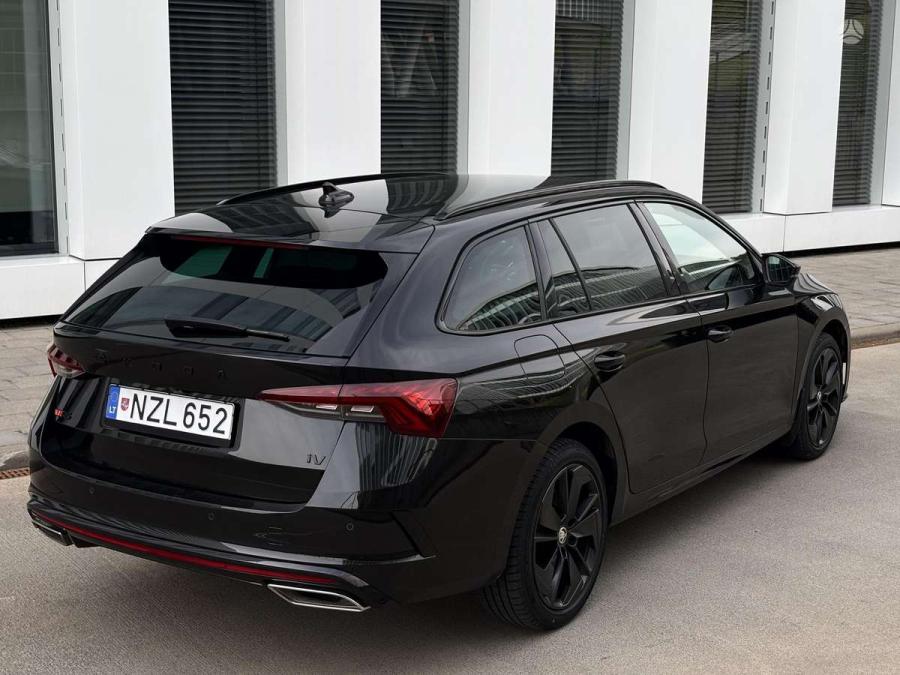 Black Skoda Octavia 2021 in Vilnius, with an engine capacity of 1.40 L and mileage of 161 thousand km for 19800 €, photo 4 on AUTOMOTO.COM.LV