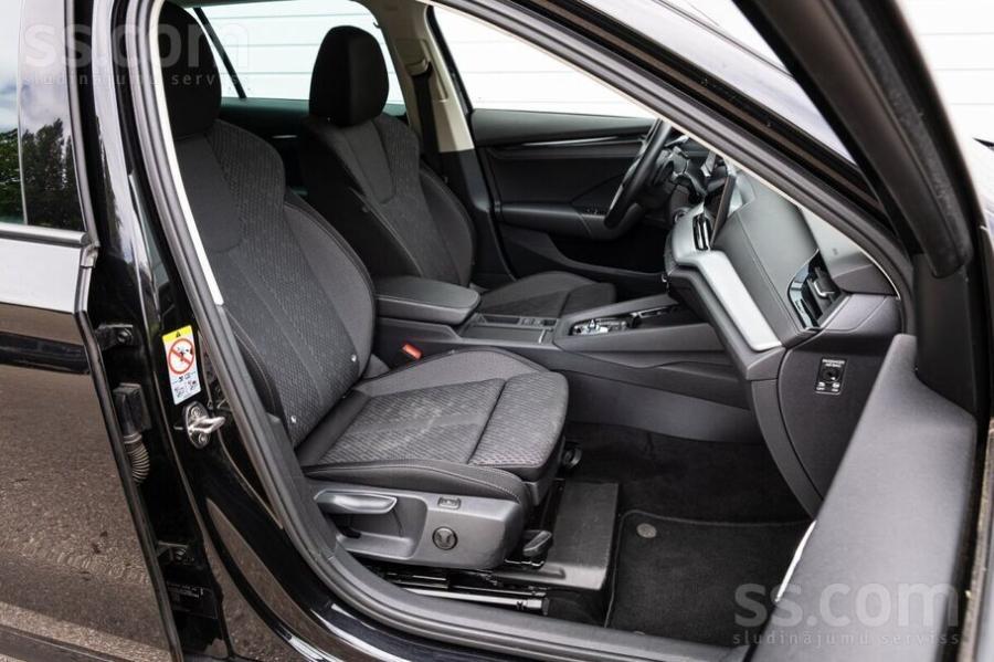 Black Skoda Octavia 2022 in Riga, with an engine capacity of 1.50 L and mileage of 103 thousand km for 18950 €, photo 8 on AUTOMOTO.COM.LV