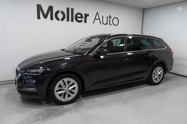 Black Skoda Octavia 2022 in Vilnius, with an engine capacity of 1.40 L and mileage of 98 thousand km for 20500 €, photo 2 on AUTOMOTO.COM.LV