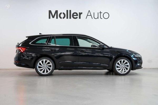 Black Skoda Octavia 2022 in Vilnius, with an engine capacity of 1.40 L and mileage of 142 thousand km for 18500 €, photo 4 on AUTOMOTO.COM.LV
