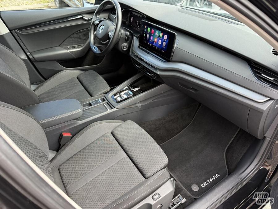 Black Skoda Octavia 2023 in Vilnius, with an engine capacity of 2.00 L and mileage of 212 thousand km for 14499 €, photo 11 on AUTOMOTO.COM.LV