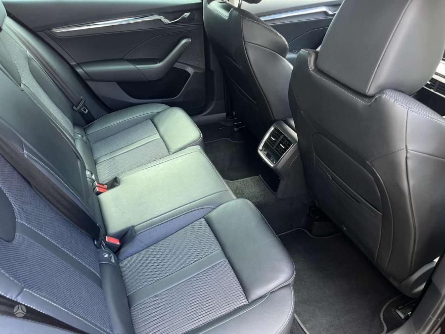 Black Skoda Octavia 2023 in Vilnius, with an engine capacity of 1.97 L and mileage of 166 thousand km for 17908 €, photo 14 on AUTOMOTO.COM.LV