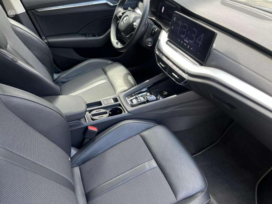 Black Skoda Octavia 2023 in Vilnius, with an engine capacity of 1.97 L and mileage of 166 thousand km for 17908 €, photo 15 on AUTOMOTO.COM.LV
