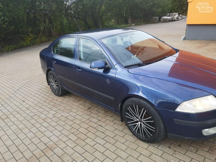 Blue Skoda Octavia 2008 in Vilnius, with an engine capacity of 1.90 L and mileage of 414 thousand km for 1449 €, photo 3 on AUTOMOTO.COM.LV