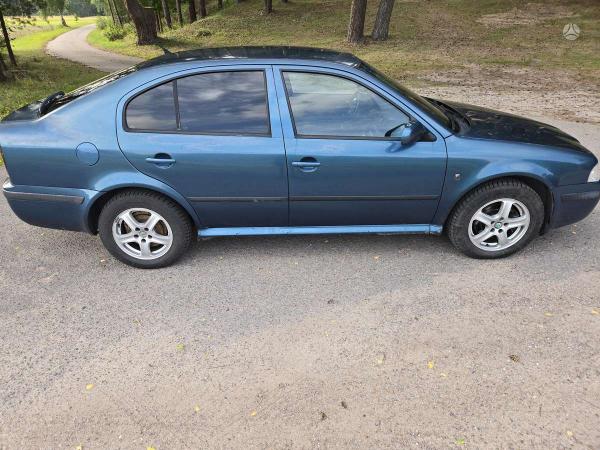 Zils Skoda Octavia 2004 Kauņa, ar dzinēja tilpumu 1.90 L un nobraukumu 356 tūkst. km par 1001 €, foto 8 vietnē AUTOMOTO.COM.LV