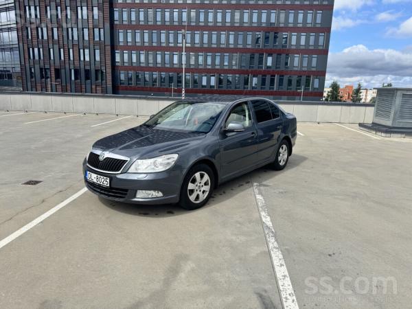 Zils Skoda Octavia 2010 Rīga, ar dzinēja tilpumu 1.40 L un nobraukumu 210 tūkst. km par 3100 €, foto 1 vietnē AUTOMOTO.COM.LV