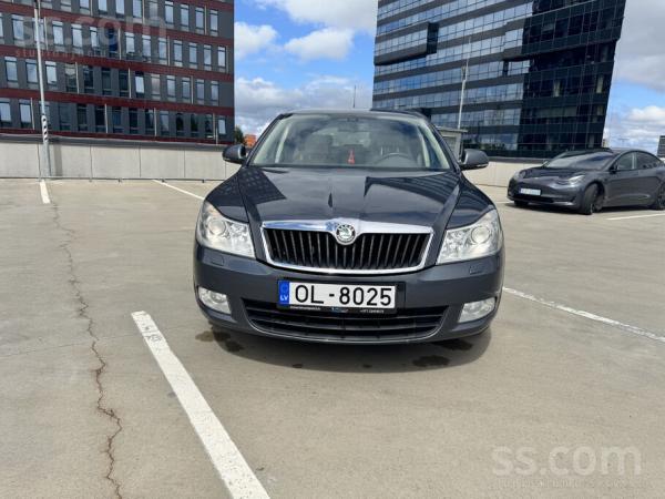 Zils Skoda Octavia 2010 Rīga, ar dzinēja tilpumu 1.40 L un nobraukumu 210 tūkst. km par 3100 €, foto 4 vietnē AUTOMOTO.COM.LV
