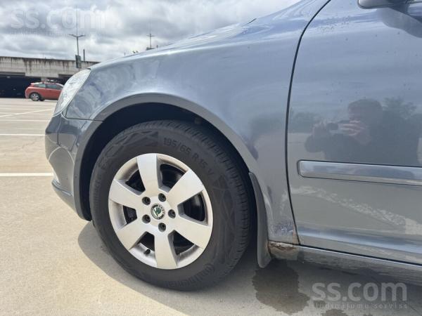 Zils Skoda Octavia 2010 Rīga, ar dzinēja tilpumu 1.40 L un nobraukumu 210 tūkst. km par 3100 €, foto 10 vietnē AUTOMOTO.COM.LV