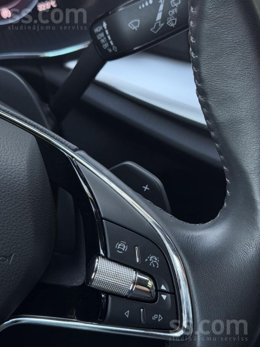 Blue Skoda Octavia 2023 in Riga, with an engine capacity of 1.40 L and mileage of 35 thousand km for 24980 €, photo 19 on AUTOMOTO.COM.LV