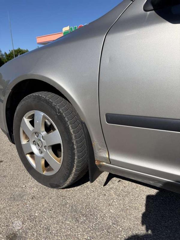Brūns Skoda Octavia 2008 Klaipėda, ar dzinēja tilpumu 1.90 L un nobraukumu 281 tūkst. km par 750 €, foto 10 vietnē AUTOMOTO.COM.LV