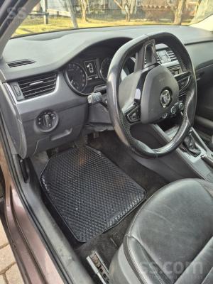 Brown Skoda Octavia 2014 in Riga, with an engine capacity of 1.60 L and mileage of 232 thousand km for 5750 €, photo 8 on AUTOMOTO.COM.LV