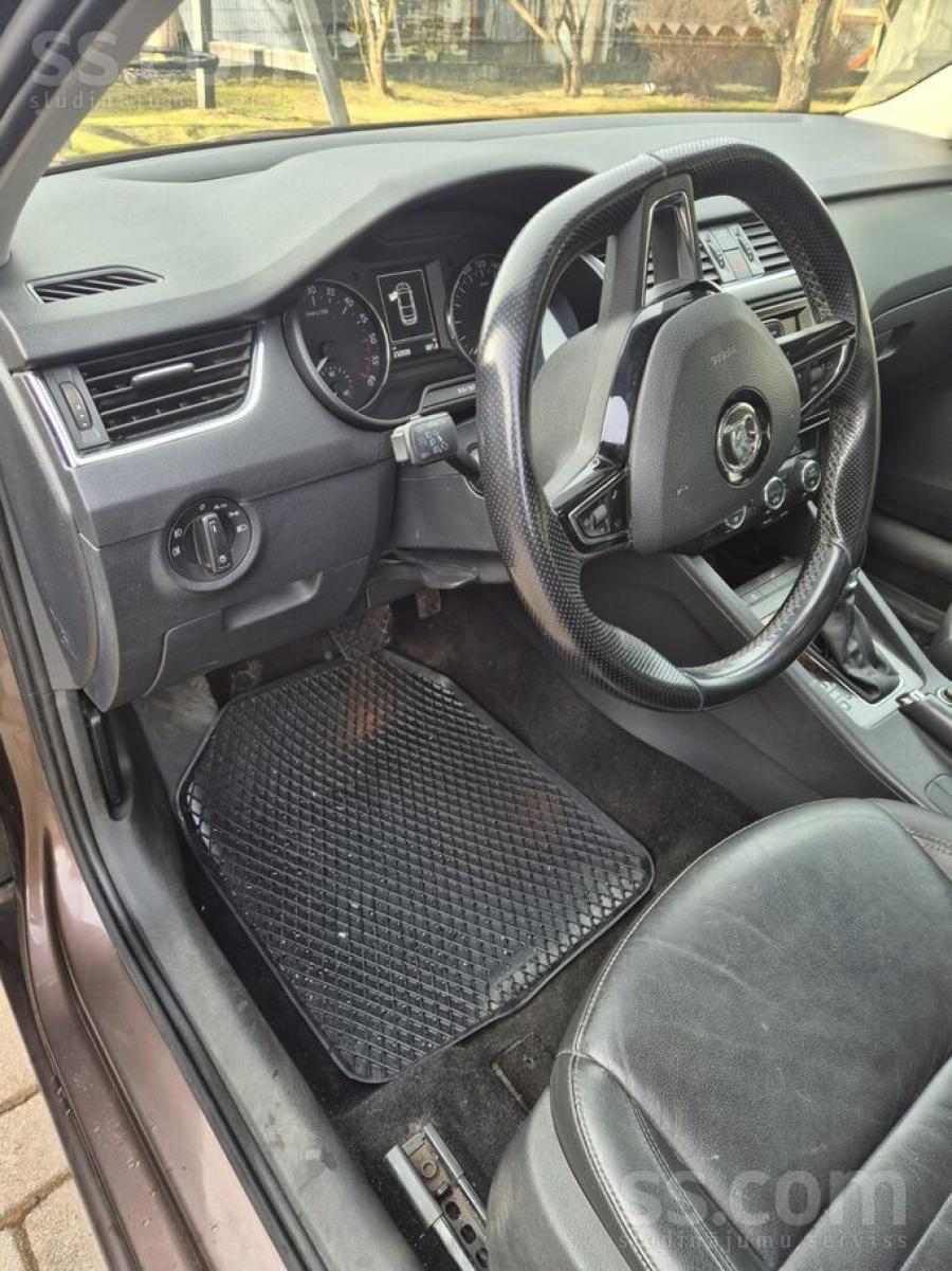Brown Skoda Octavia 2014 in Riga, with an engine capacity of 1.60 L and mileage of 232 thousand km for 5750 €, photo 8 on AUTOMOTO.COM.LV
