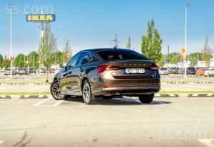 Brown Skoda Octavia 2020 in Riga, with an engine capacity of 2.00 L and mileage of 88 thousand km for 16190 €, photo 8 on AUTOMOTO.COM.LV
